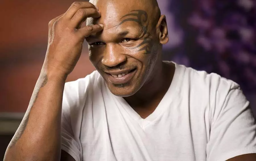 Mike Tyson a adoptat celebrități